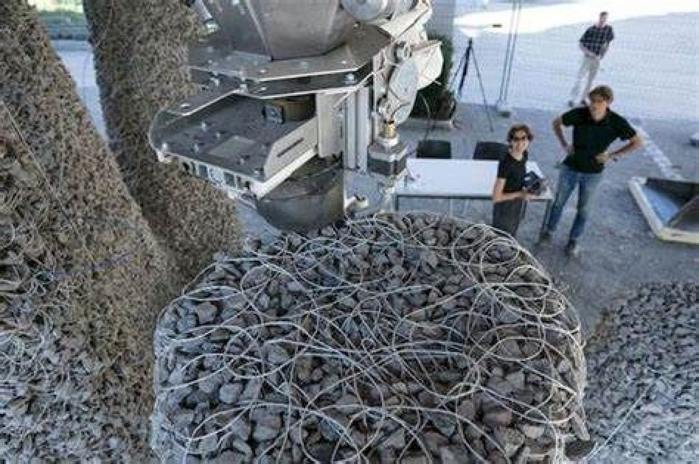 Construction Robot Creates a Pavilion from Stones and String! - Arch2O.com