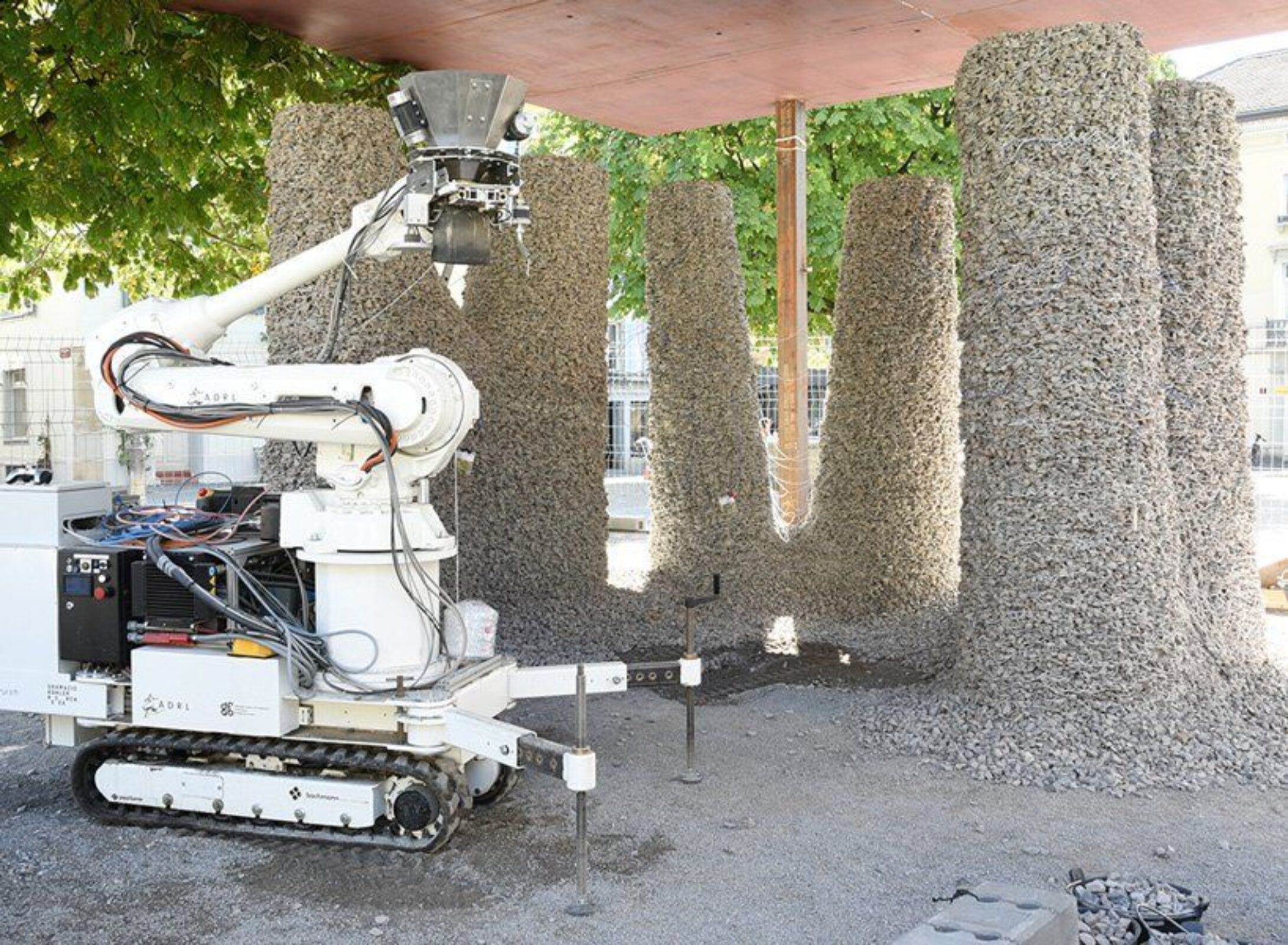 Construction Robot Creates a Pavilion from Stones and String! - Arch2O.com