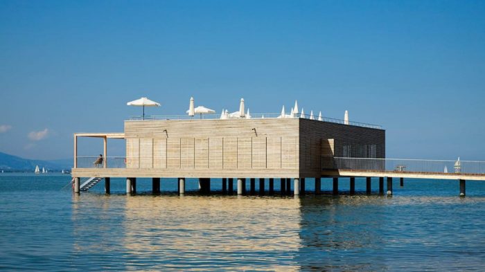 8 Buildings that Incorporate Wood Cladding and Kinetic Facades - Arch2O.com