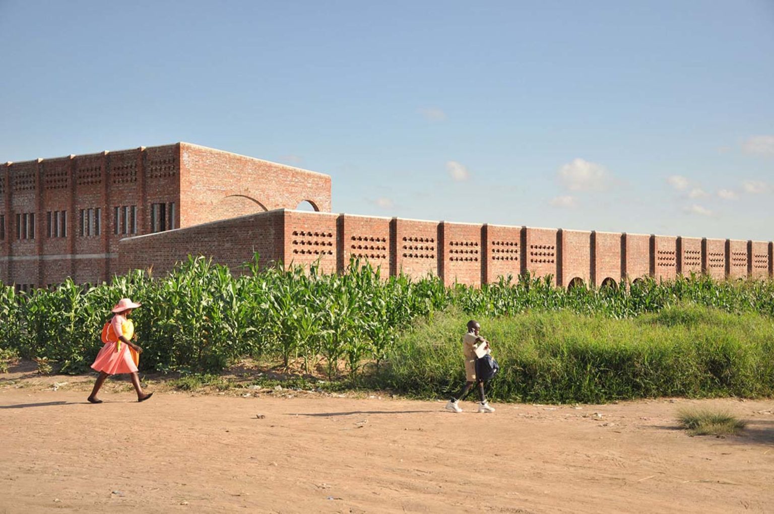 Zimbabwean Primary School Builds an Enclosed Pathway Beneath Arched ...