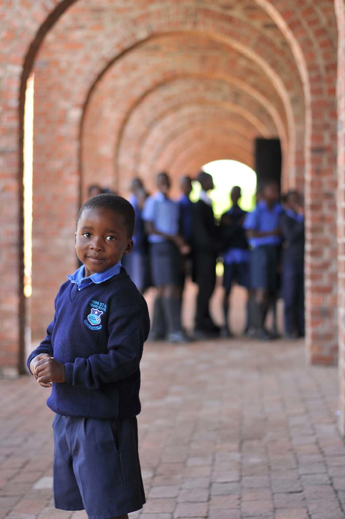Zimbabwean Primary School Builds an Enclosed Pathway Beneath Arched ...