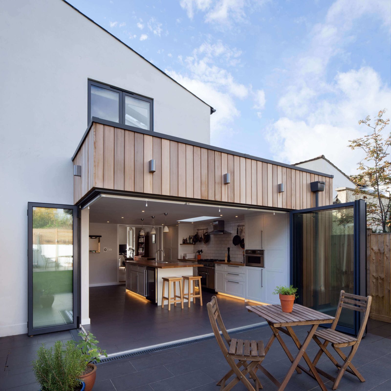 15 Projects That Captivate With Their Glass Extensions' Light-Filled ...
