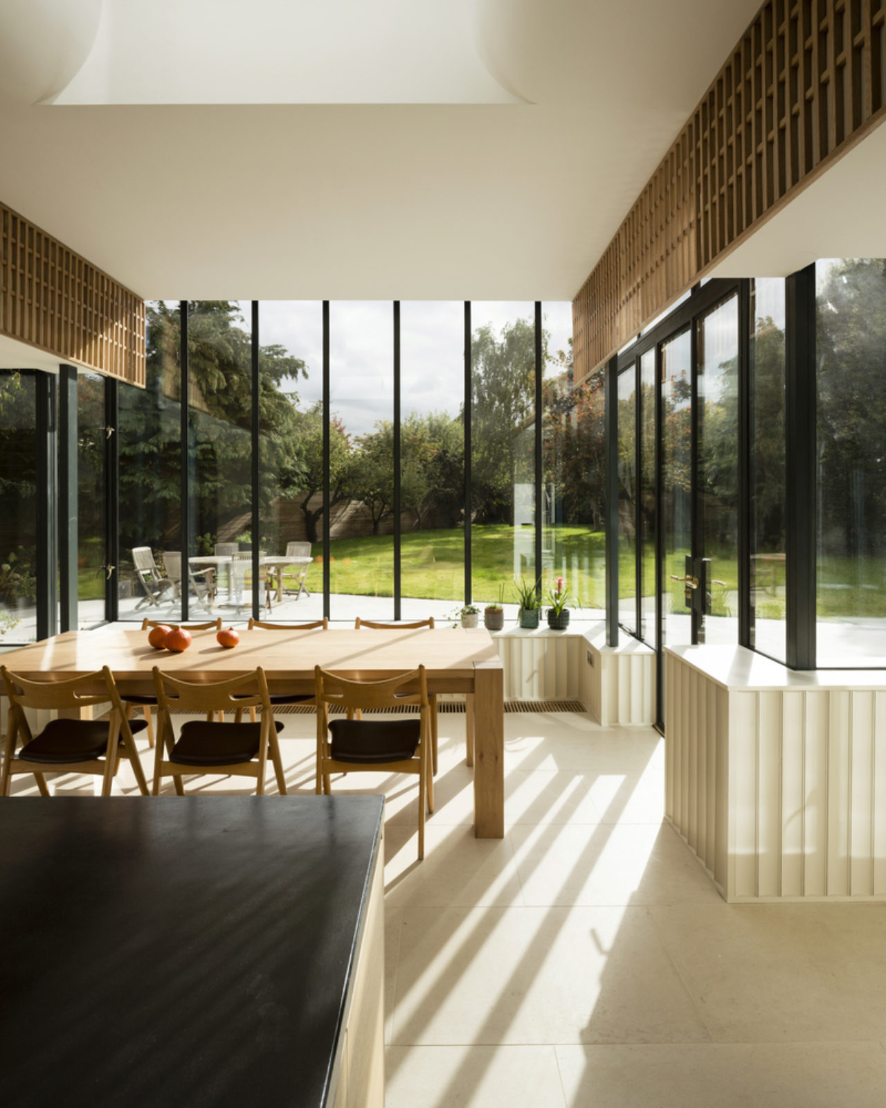 15 Projects That Captivate With Their Glass Extensions' Light-Filled ...