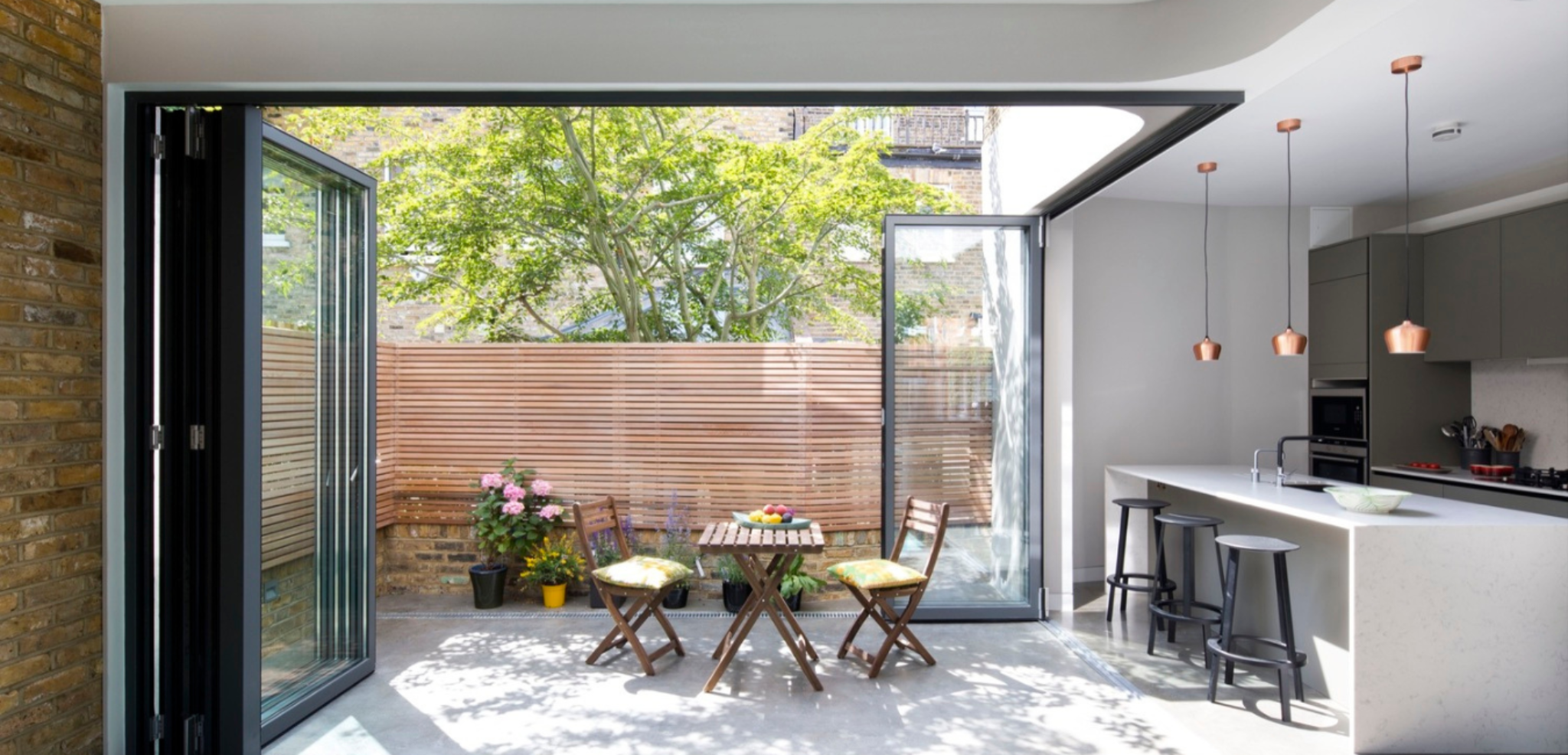 15 Projects That Captivate With Their Glass Extensions' Light-Filled ...